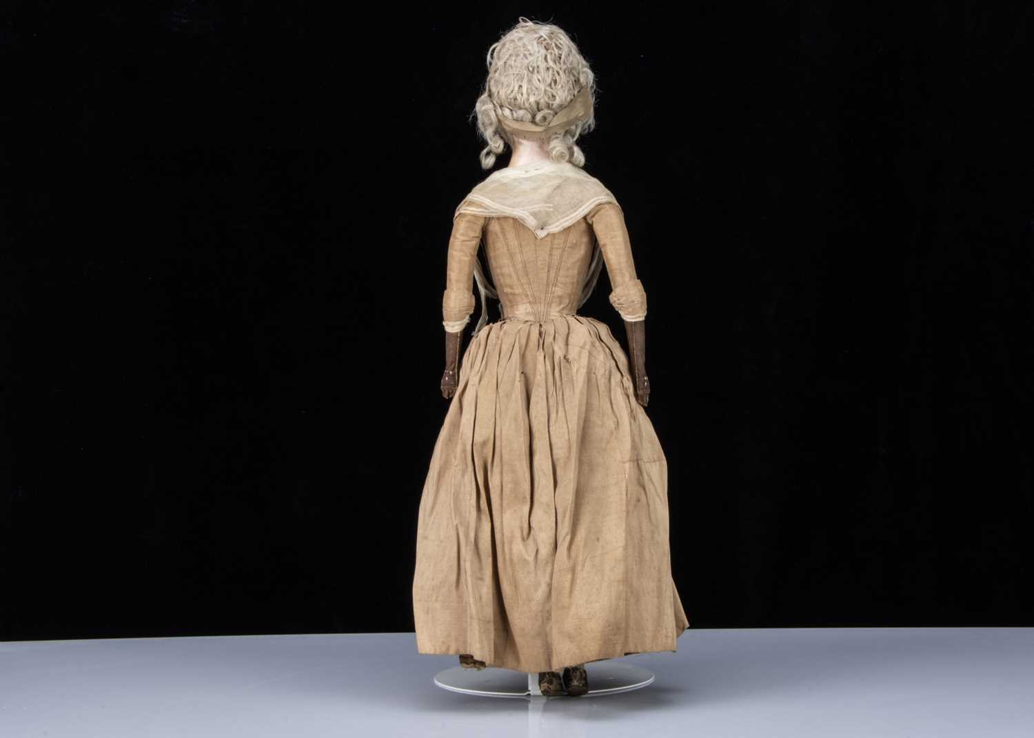 A rare and fine 1780s English wooden doll, turned and carved wooden ...