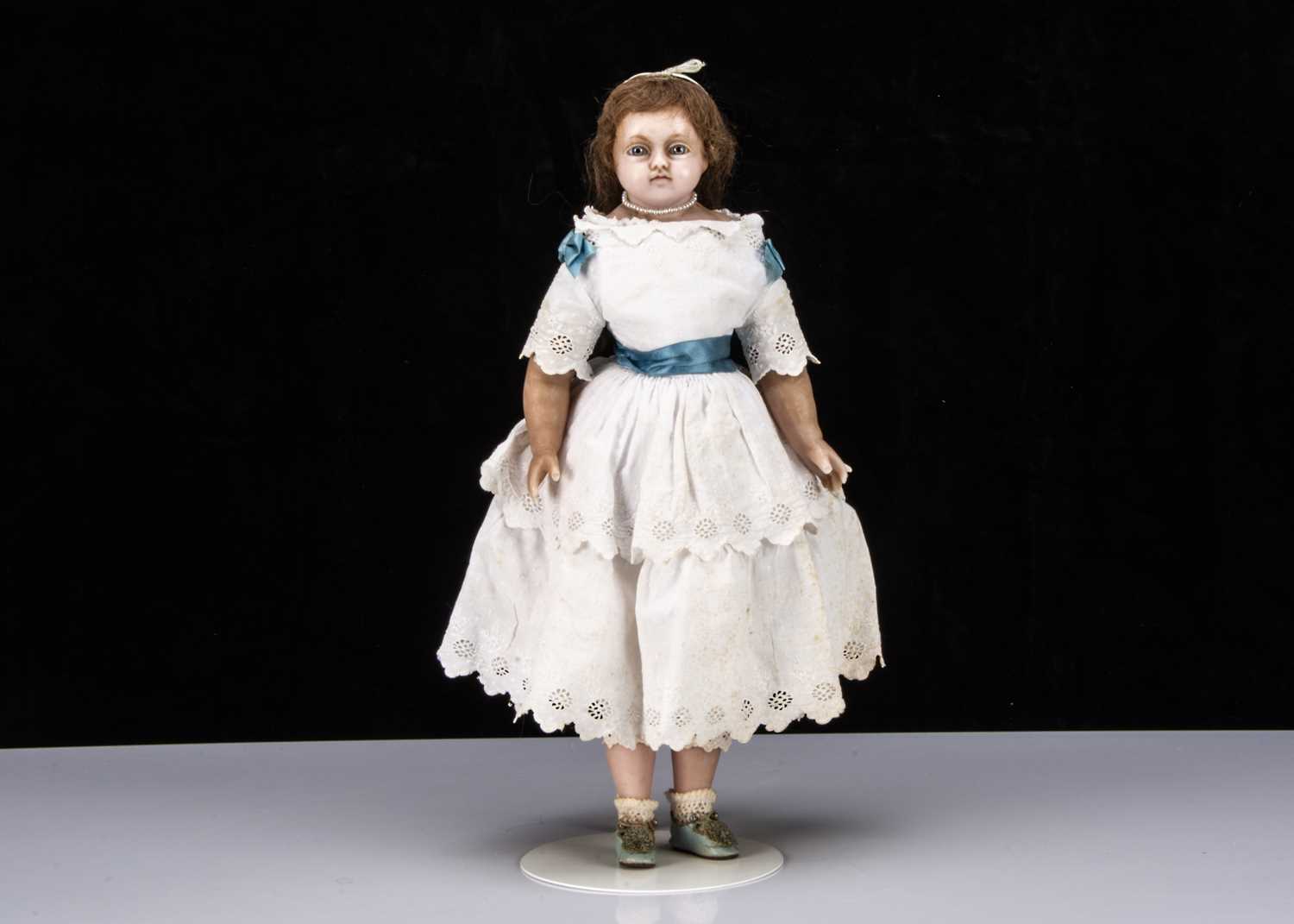 A 19th century English poured wax child doll, possibly Montanari, with ...