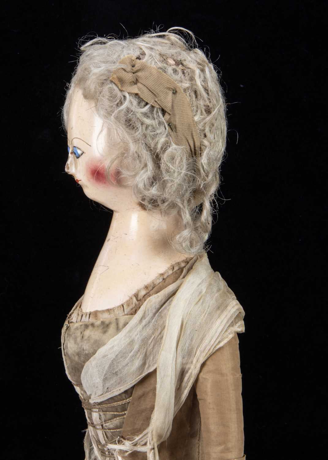 A rare and fine 1780s English wooden doll, turned and carved wooden ...