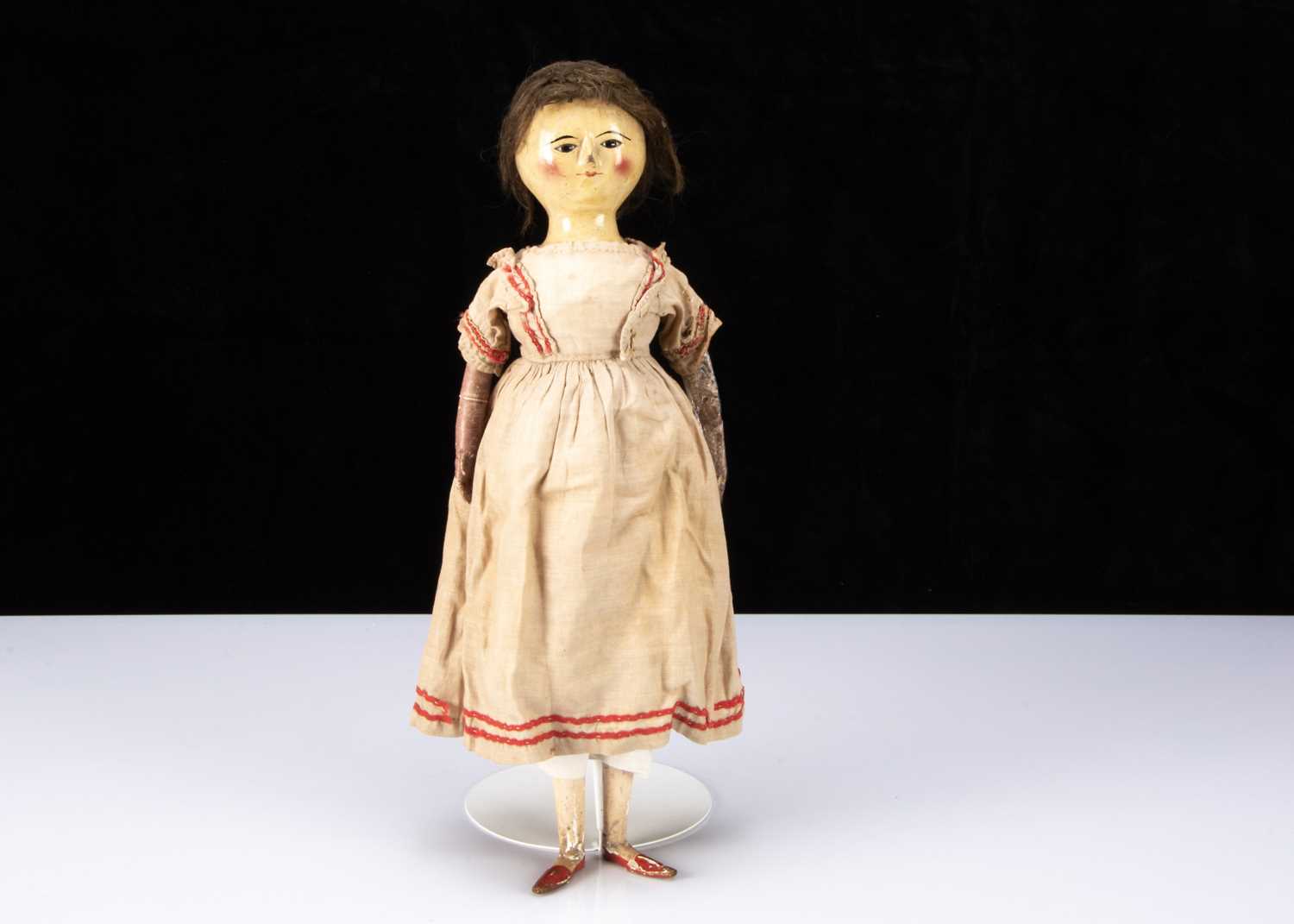 An interesting English wooden girl doll, circa 1800 turned and carved ...