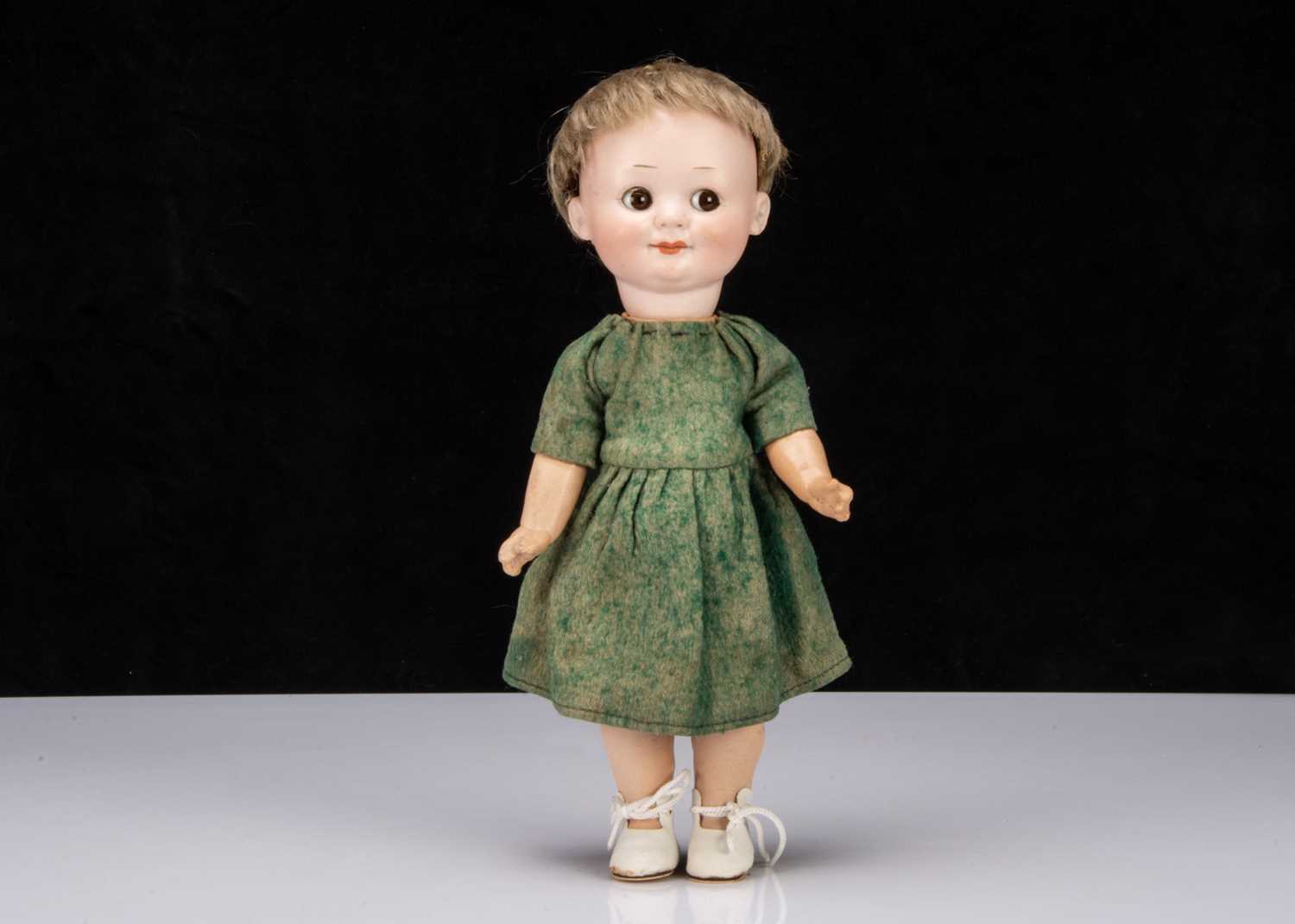 An Armand Marseille 323 googly eyed girl doll, with brown sleeping side ...