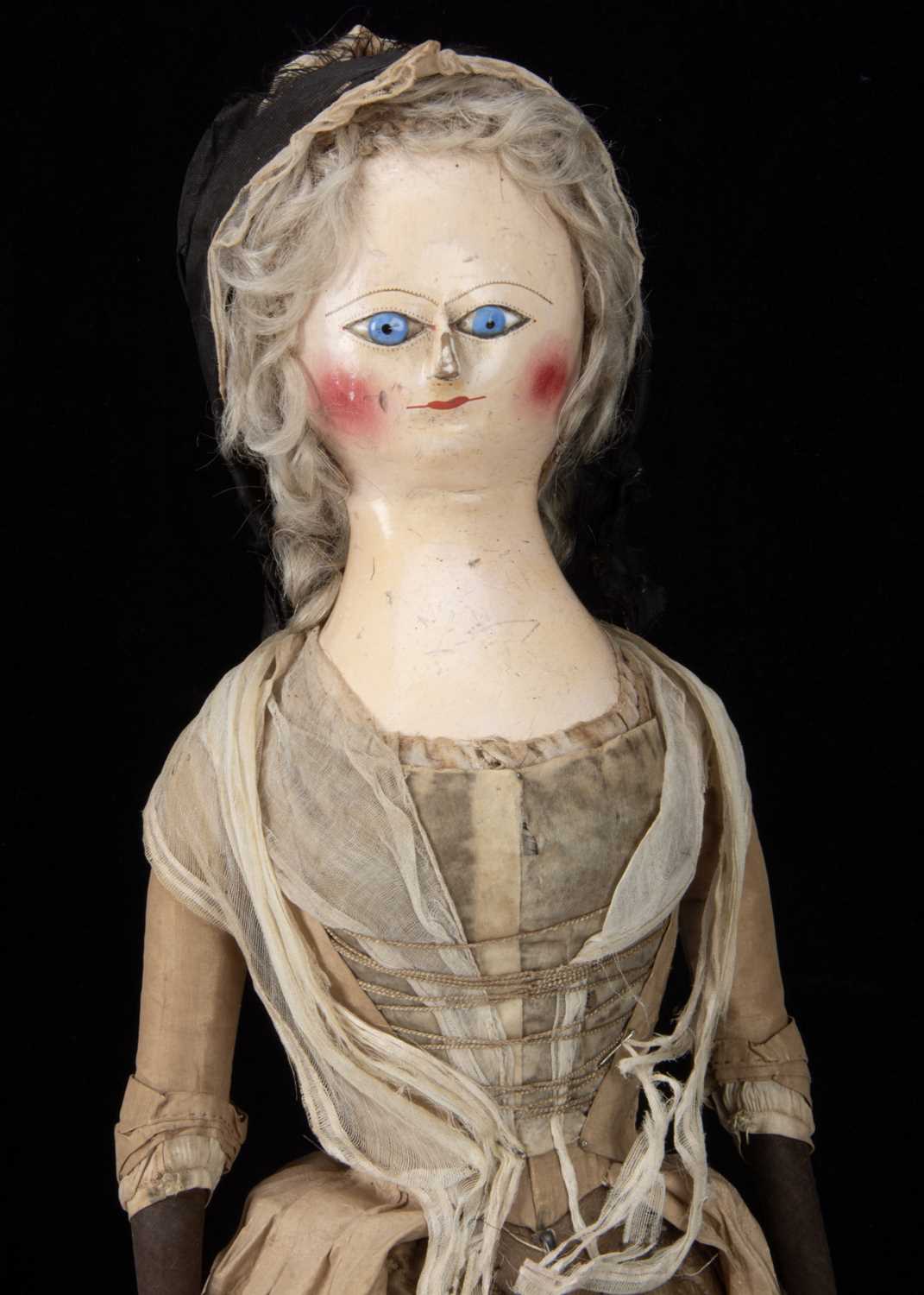 A rare and fine 1780s English wooden doll, turned and carved wooden ...