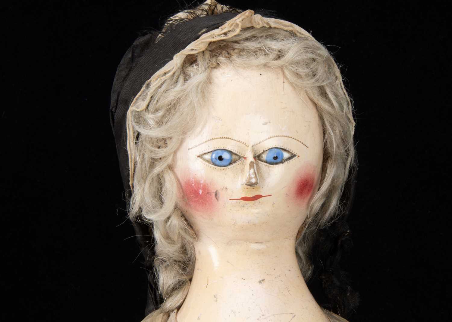 A rare and fine 1780s English wooden doll, turned and carved wooden ...
