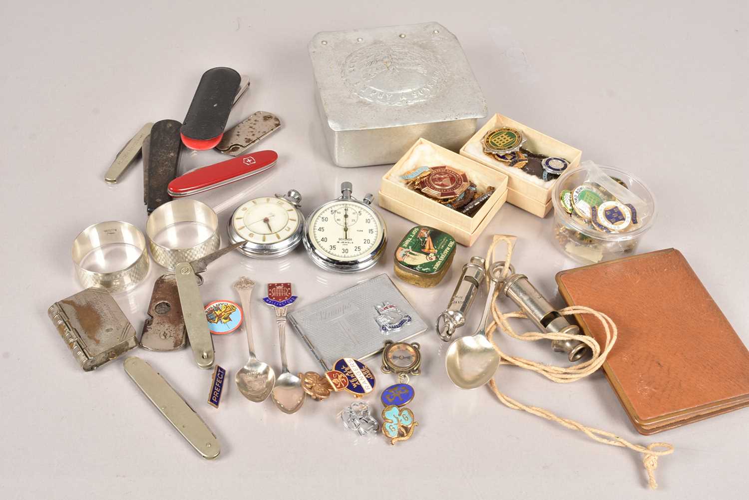 An assortment of various items, to include a pair of silver napkin ...