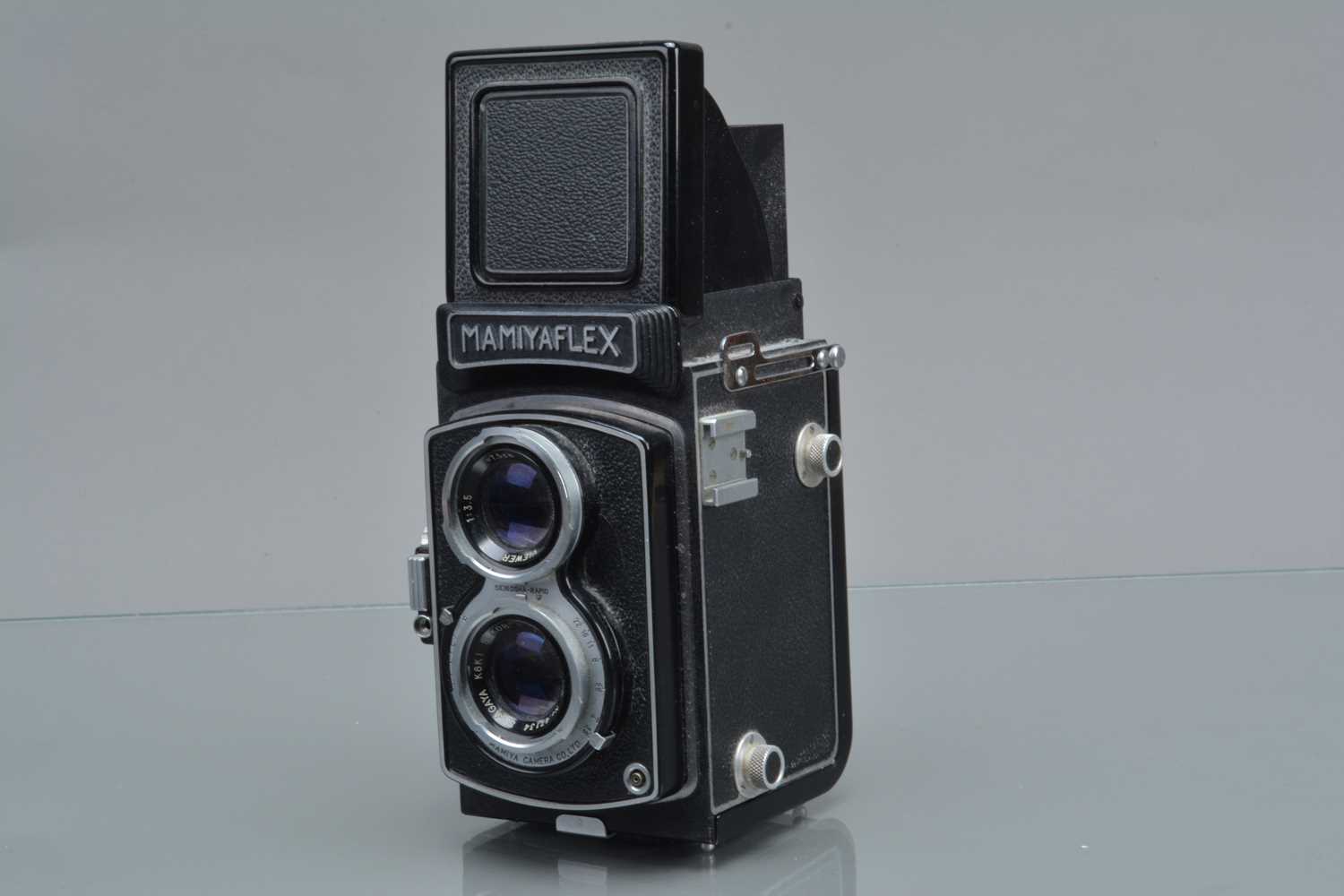 A Mamiya Mamiyaflex II TLR Camera, shutter working, body G, with Koki ...