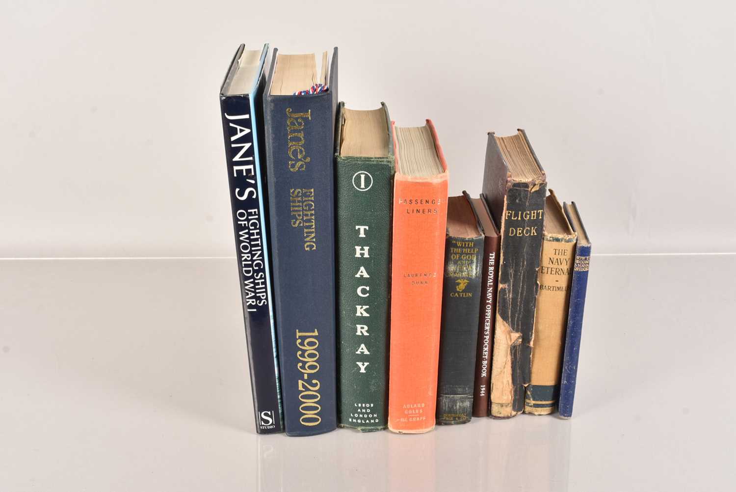 An assortment of Naval Books, to include How To Become a Naval Officer ...