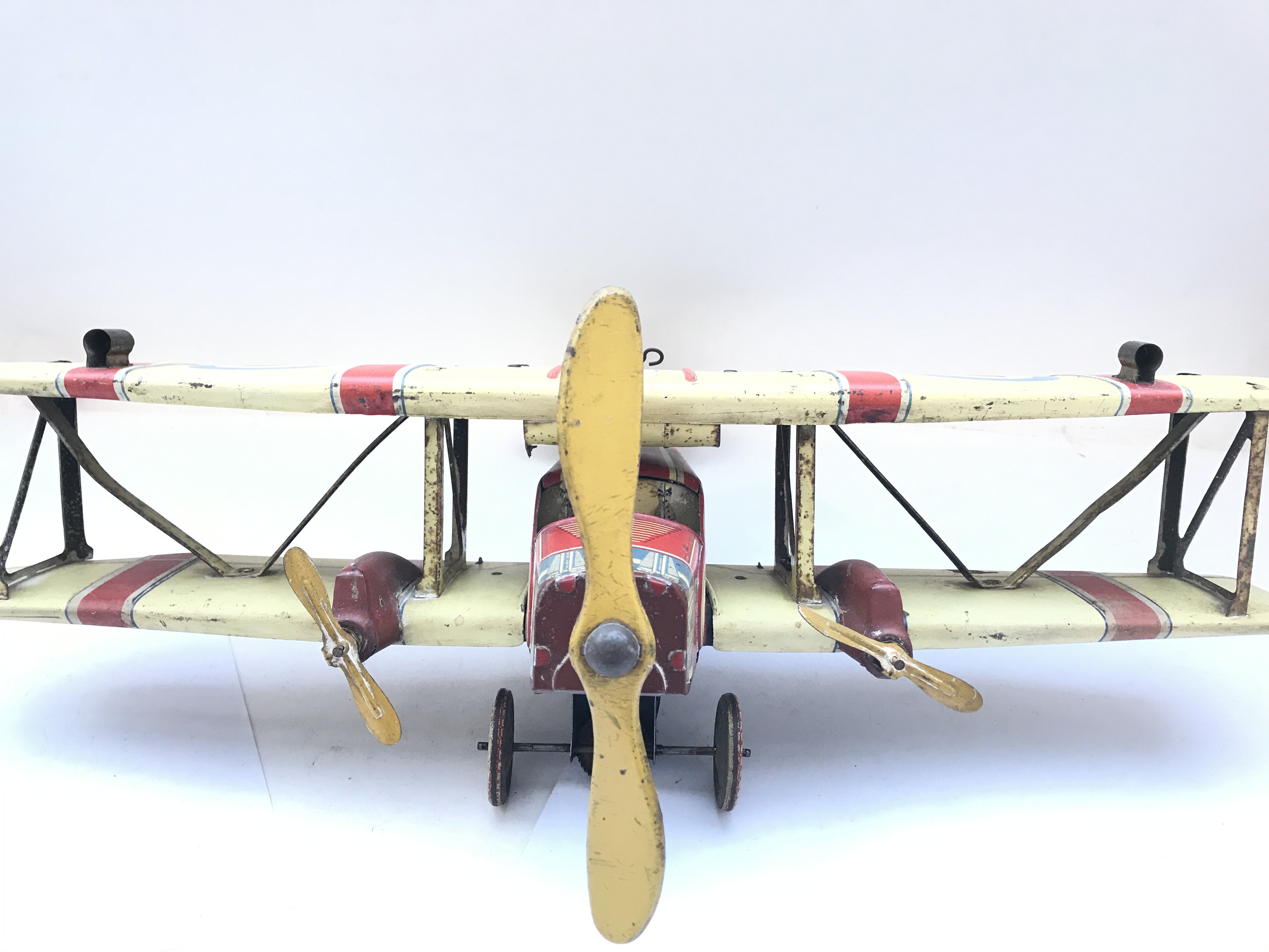 A Vintage Tin plate Clockwork Bi-Plane. Seen Working. Approx length ...