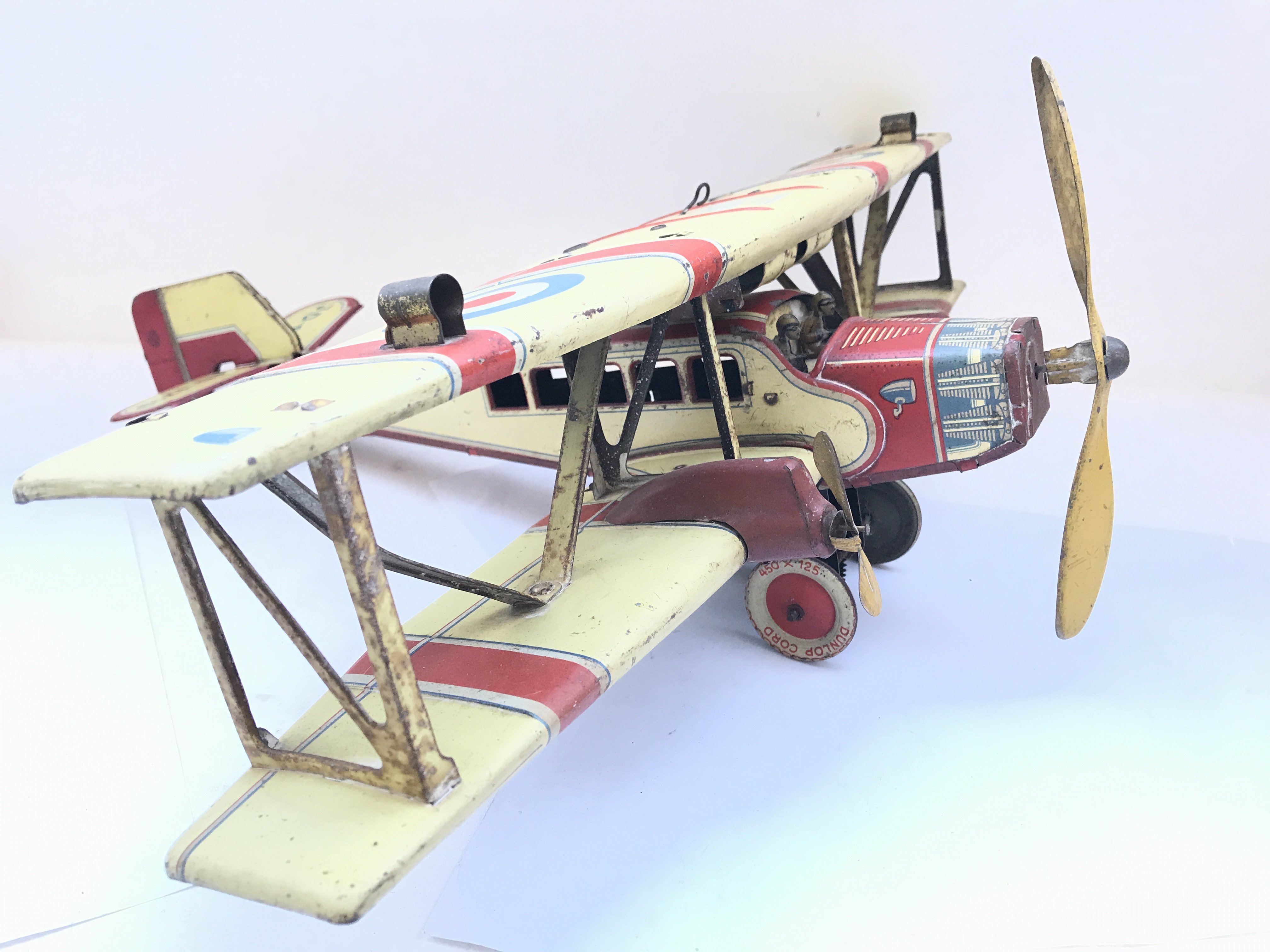 A Vintage Tin plate Clockwork Bi-Plane. Seen Working. Approx length ...