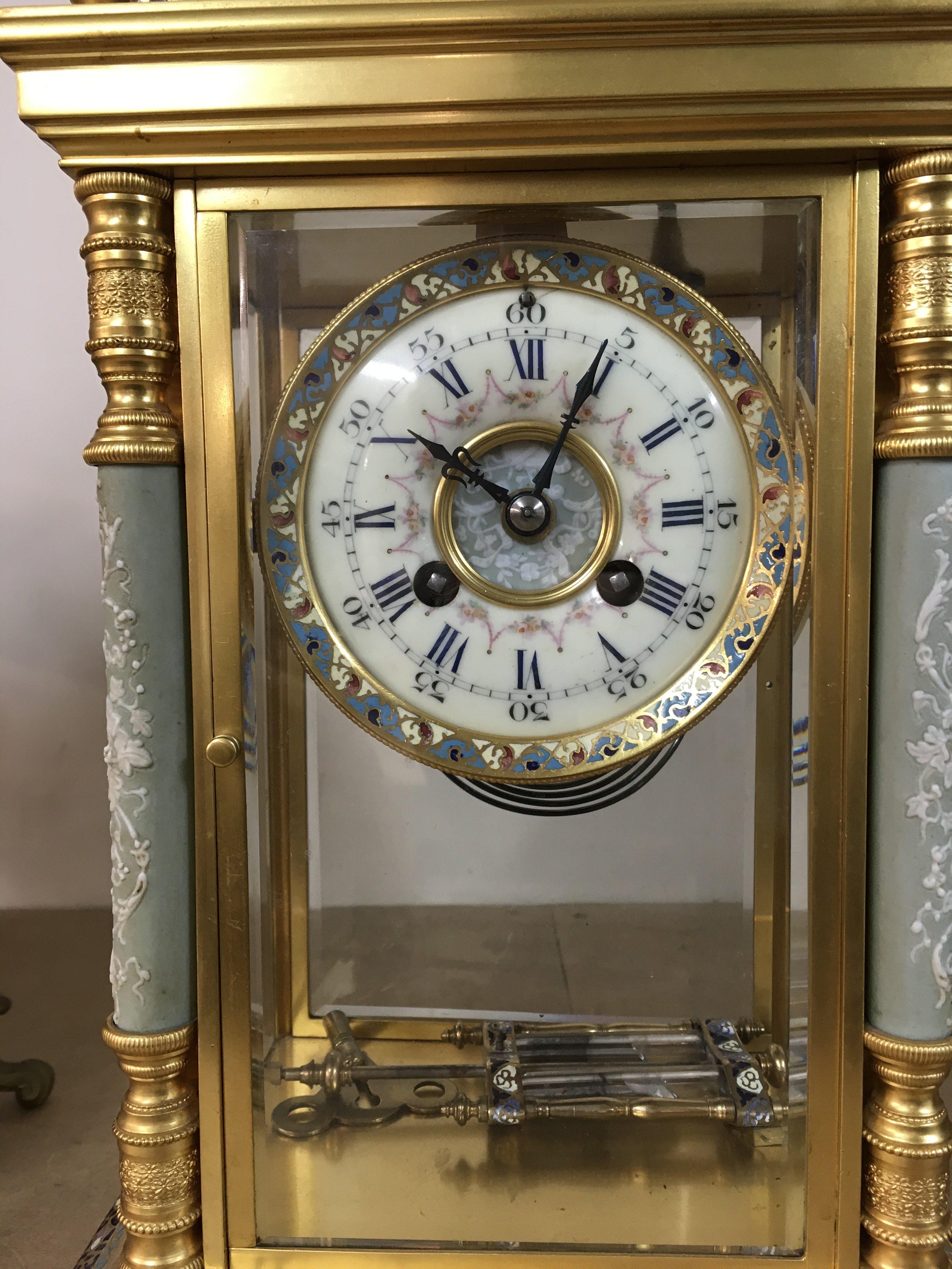 A french 19th century 4 glass guilt mantle clock with enamel inlay and ...