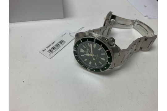 A boxed seiko tortoise divers watch with green dial and bezel with card ...