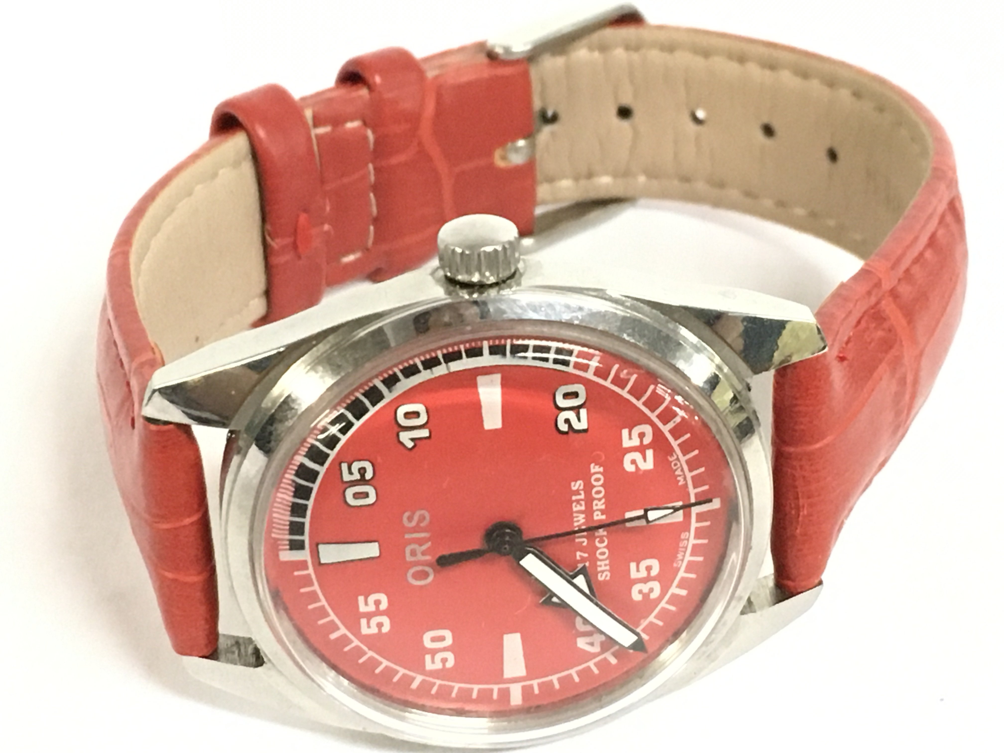 A vintage Red dial Oris mens watch. Postage category A