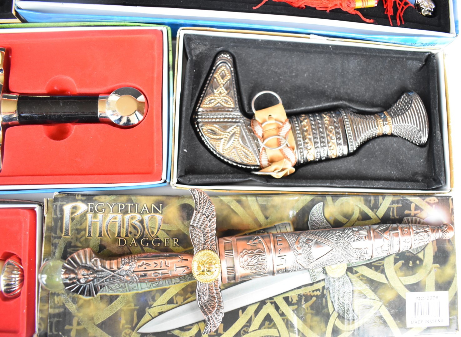 Ten replica knives / daggers including Kukri, Egyptian Pharaoh dagger ...