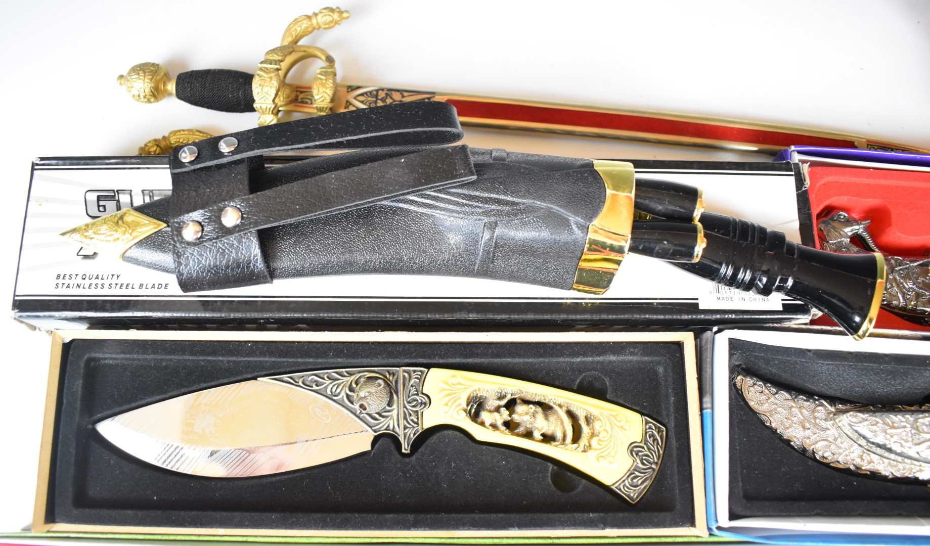 Ten replica knives / daggers including Kukri, Egyptian Pharaoh dagger ...