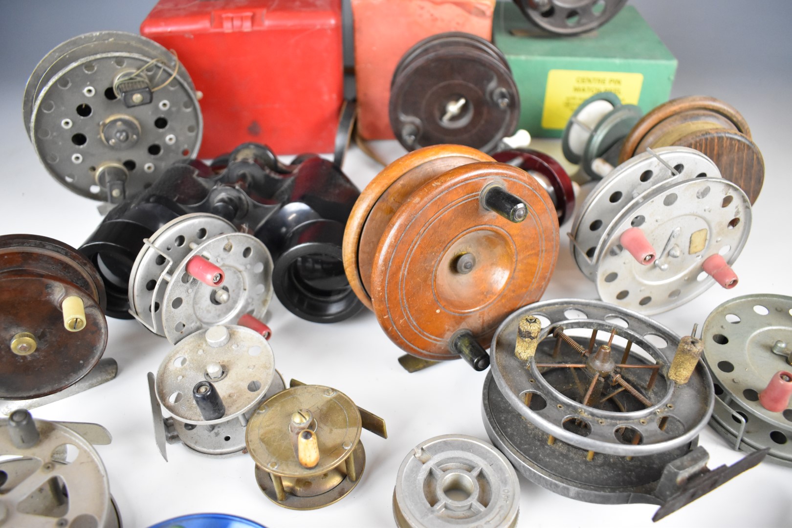 Collection of vintage fishing reels including brass centrepin reels ...
