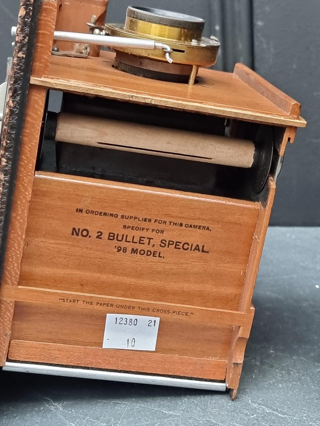 Cameras: a Eastman Kodak 'No.2 Bullet Special' 1898 model.
