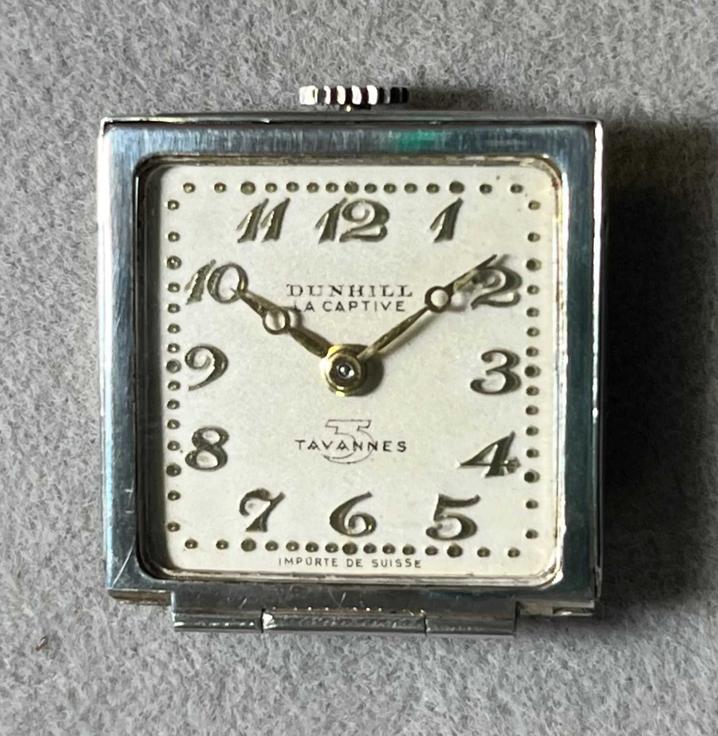 A sterling silver cased Dunhill La Captive purse watch, the sterling ...