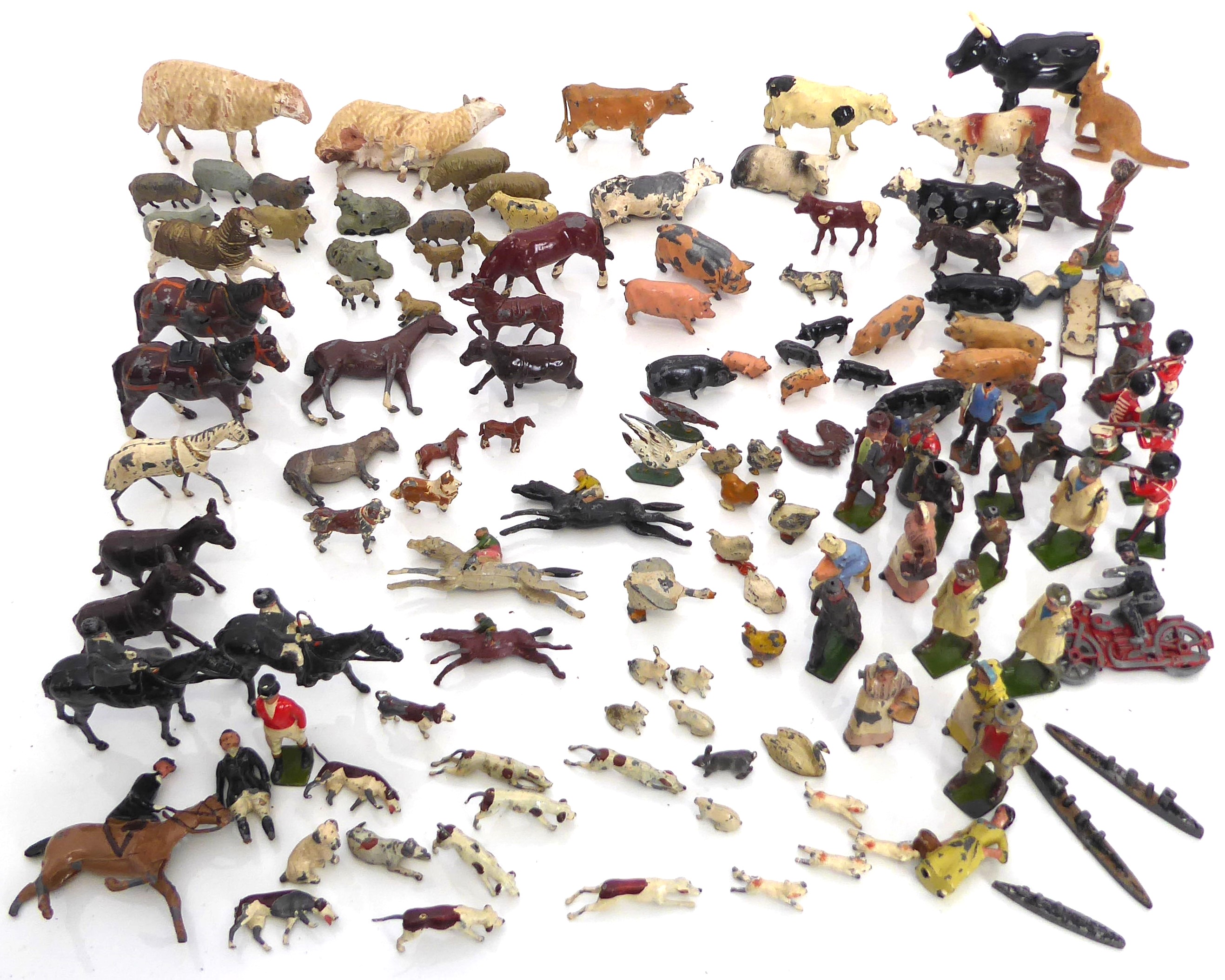 A collection of vintage lead farm animals, figures and accessories by ...
