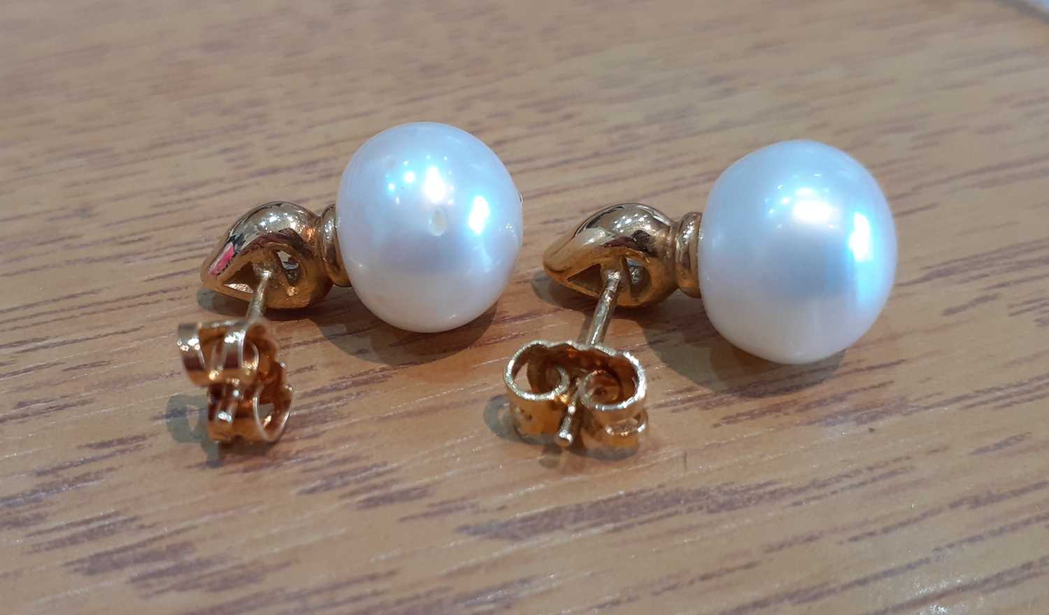 A Pair of 18 Carat Gold Cultured Pearl and Diamond Earrings, by Boodle ...