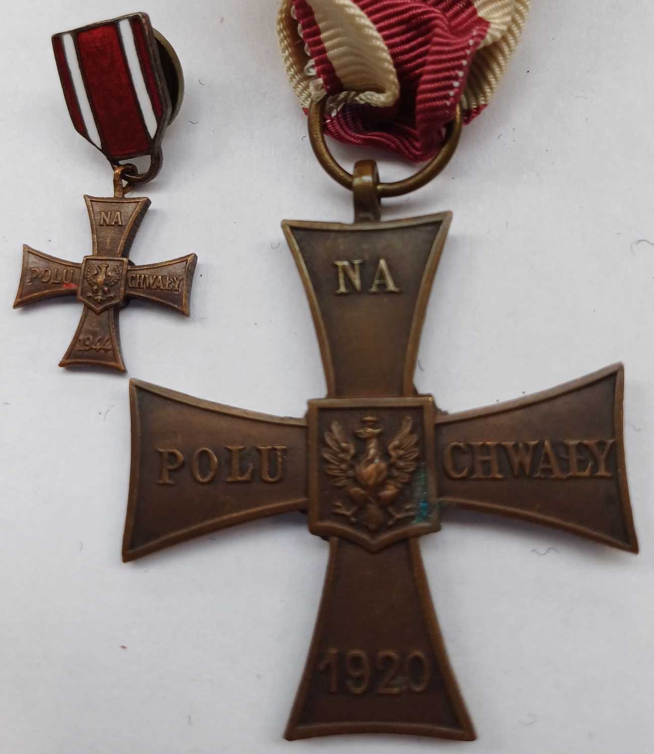A Collection of Polish Medals and Badges, including a Cross of Valour ...