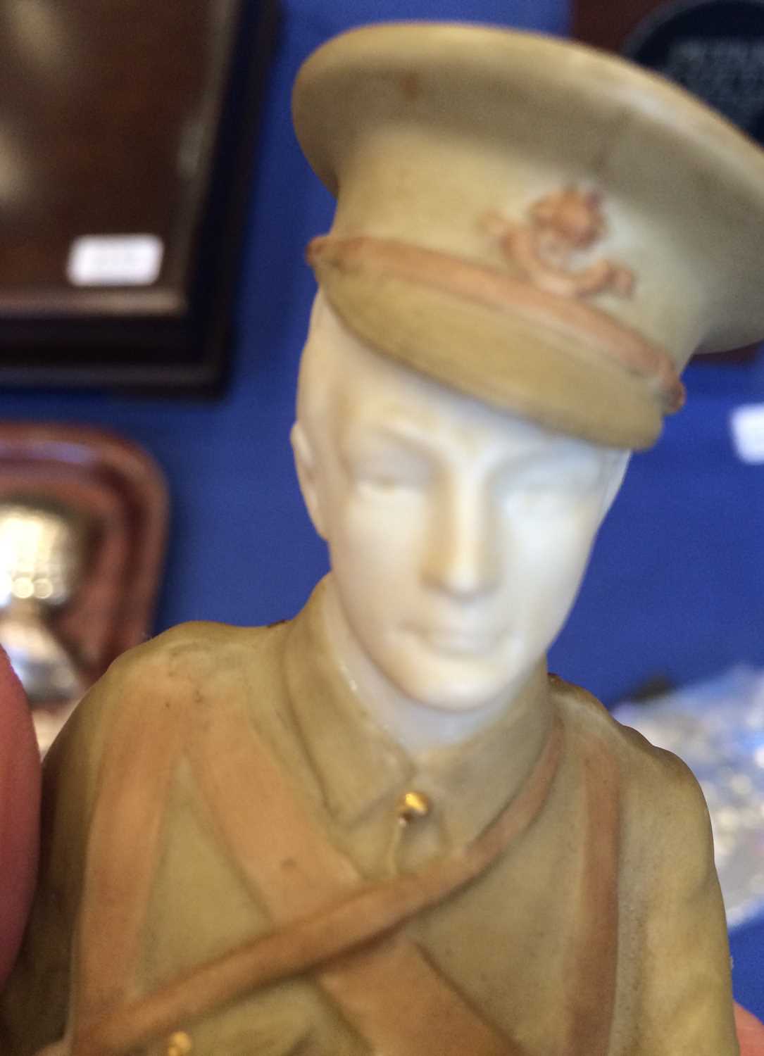 A Royal Worcester Porcelain Figure, 1912, modelled as a soldier of the ...