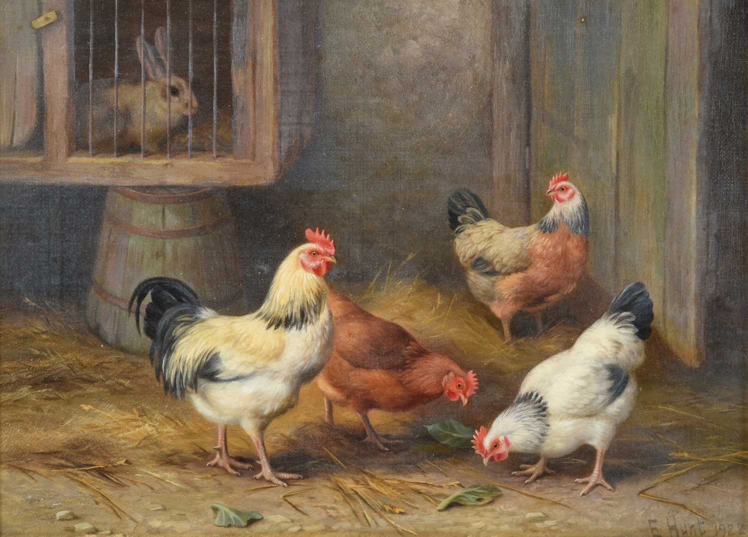 Edgar Hunt (1876-1953) Chickens and a rabbit in a stable Signed and ...