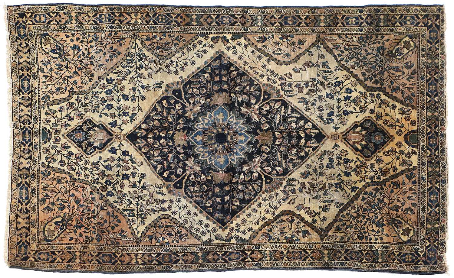 Saroukh Rug West Iran, circa 1930 The ivory field of angular vines ...