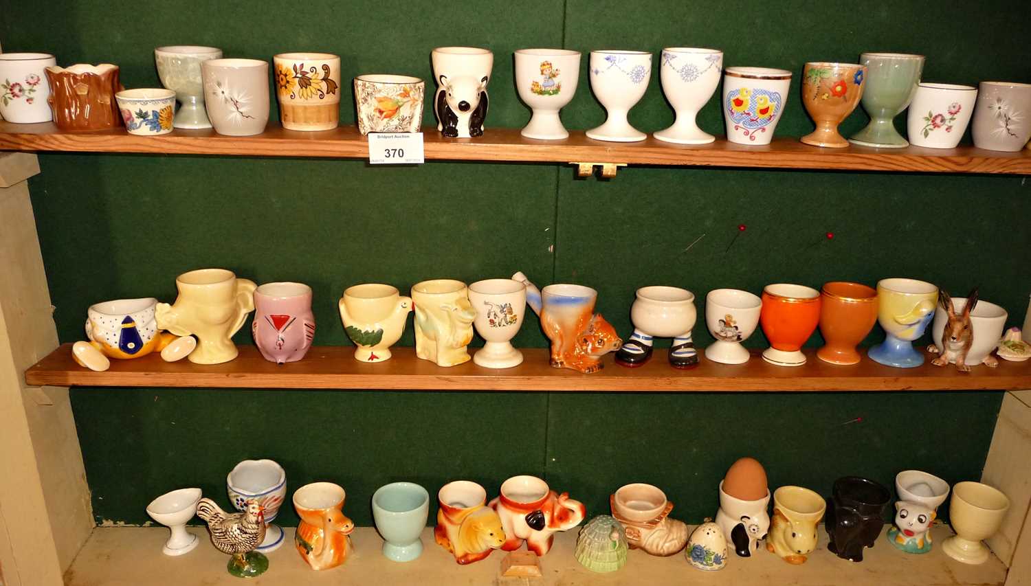 Large collection of assorted china egg cups, inc. Carlton Walking Ware ...