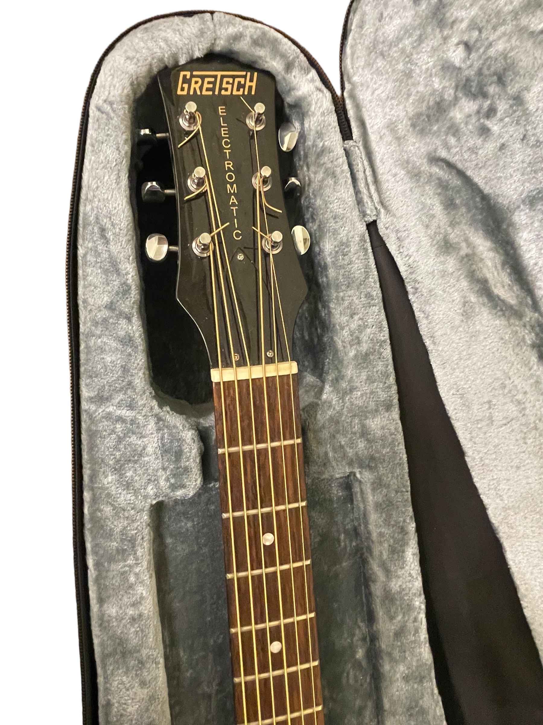 Gretch electromatic baritone electric guitar with canvas case.