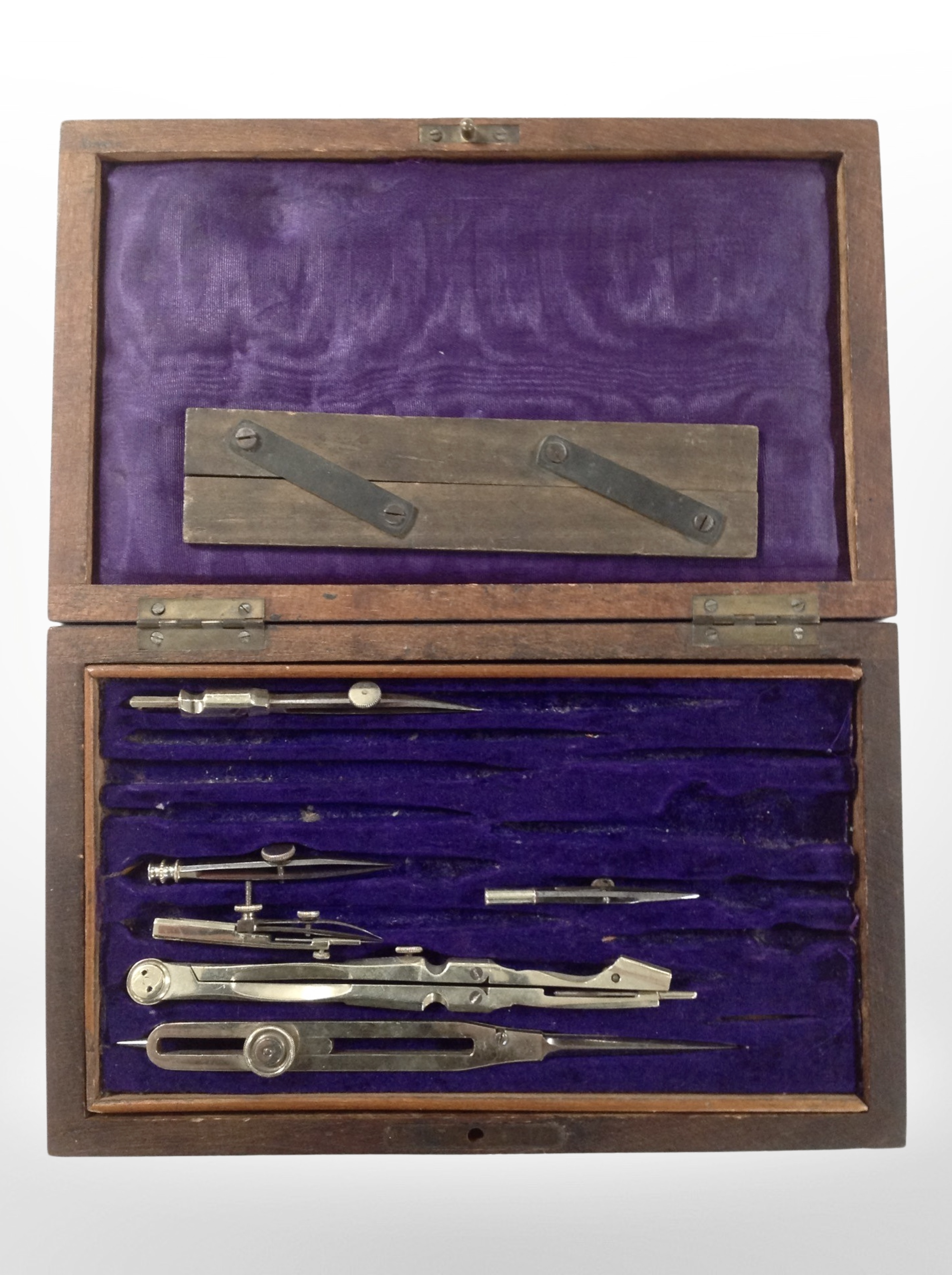 A part set of antique drawing instruments in a rosewood brass-inlaid ...