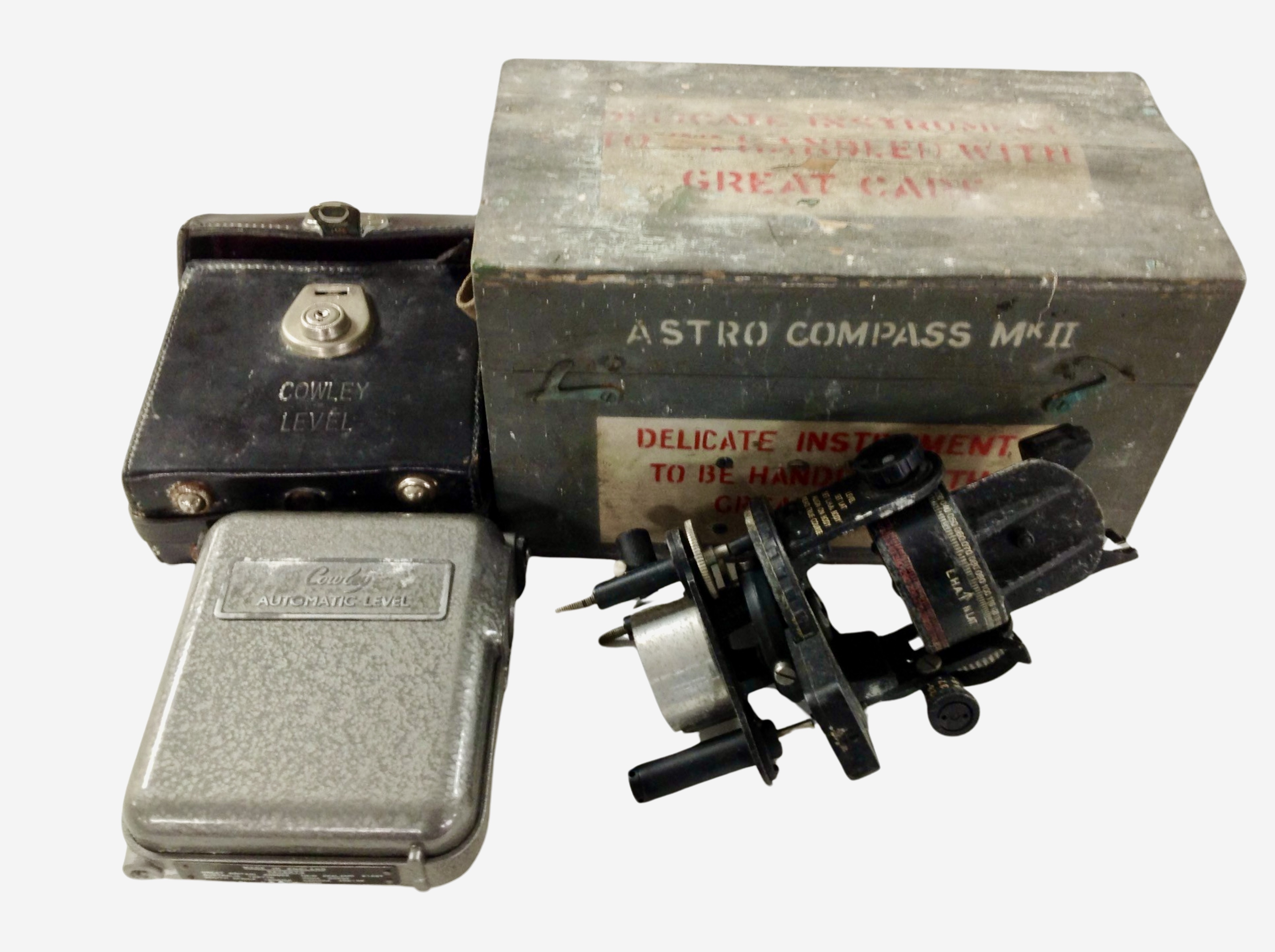 A Cowley automatic level in leather case, and an Astro Compass mark II ...
