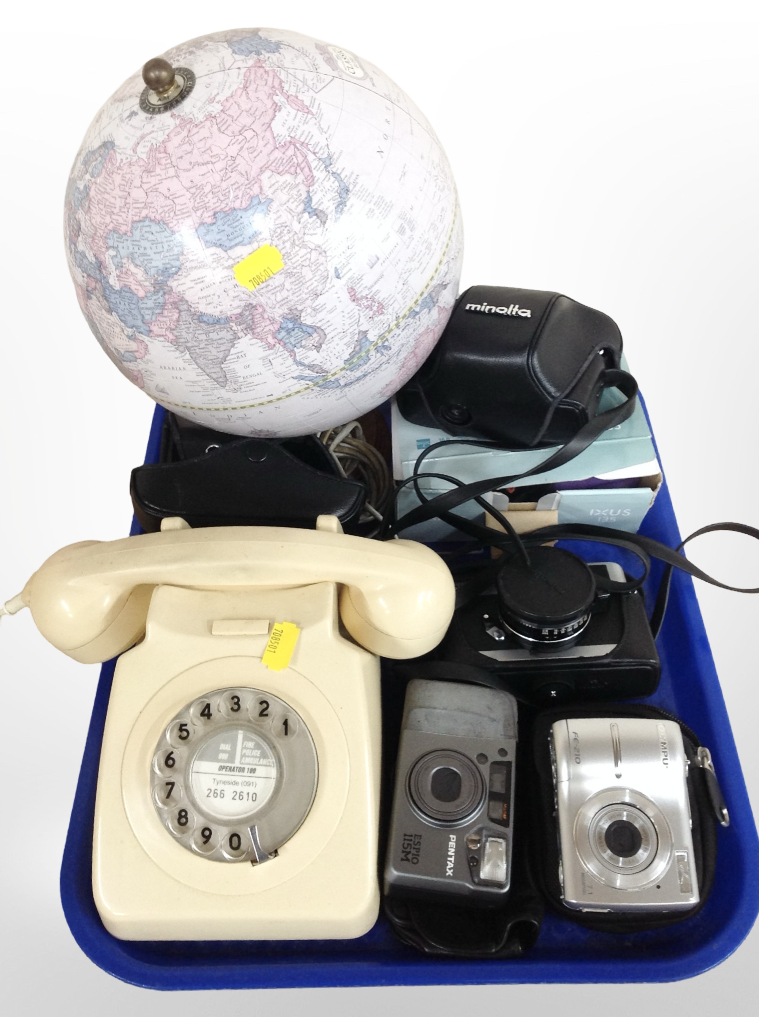 A vintage cream plastic telephone, together with several vintage and ...