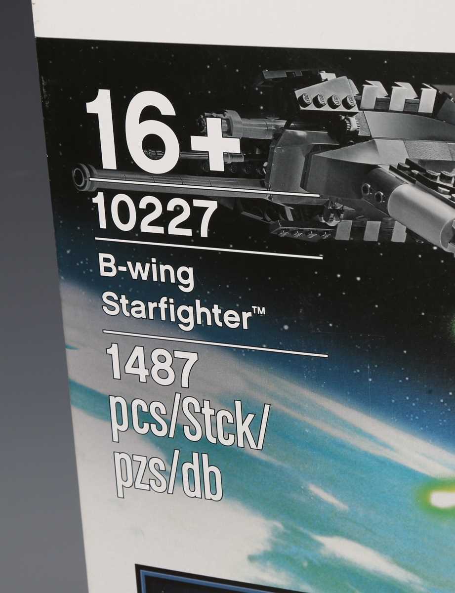 A Lego Star Wars No. 10227 B-Wing Starfighter, boxed with three ...