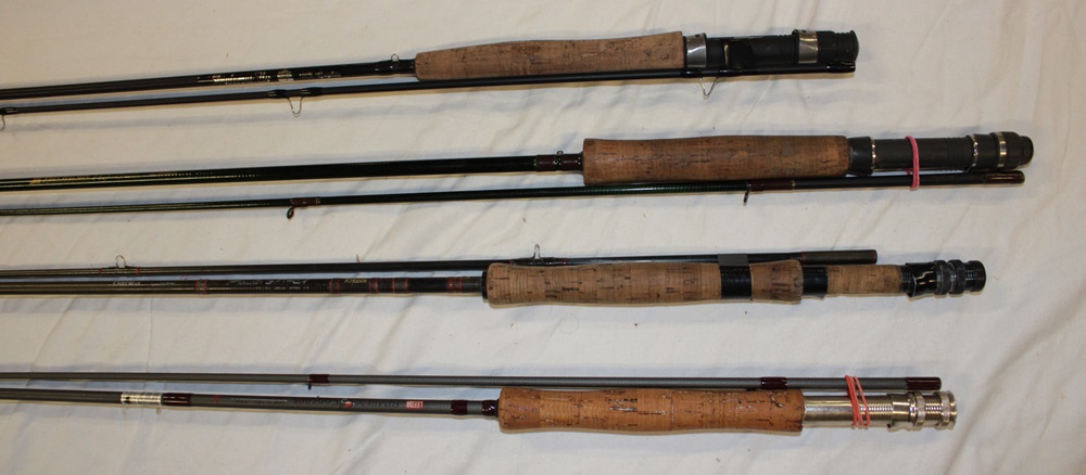 Four various carbon fibre fly fishing rods including Diplomat fly ...