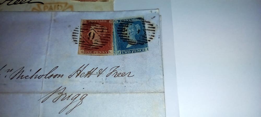 A penny red, a twopenny blue and one other postage stamp on postmarked ...