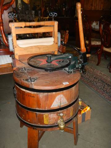 A early hand operated washing machine. COLLECT ONLY.