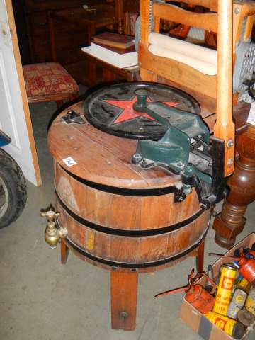 A early hand operated washing machine. COLLECT ONLY.