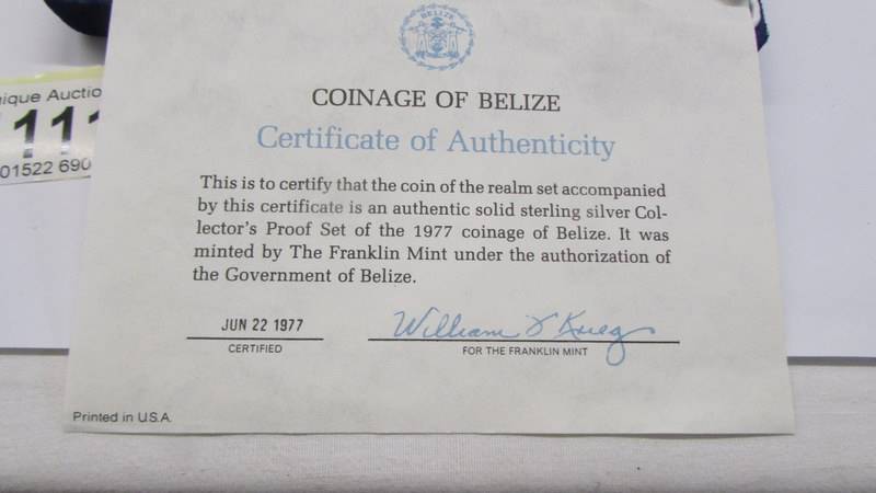 A cased proof set of solid silver 1977 Belize coins with certificate.
