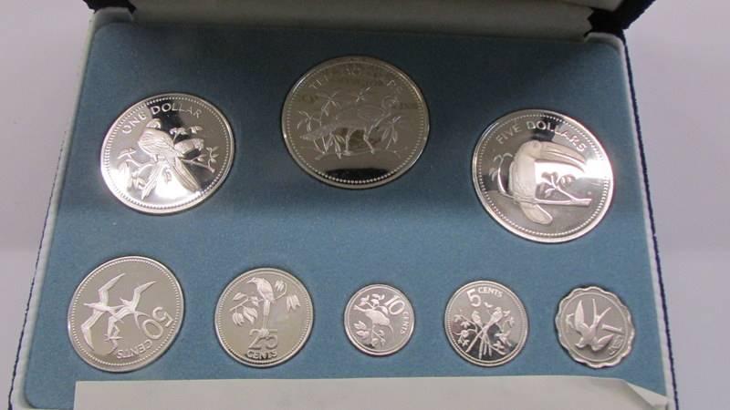 A cased proof set of solid silver 1977 Belize coins with certificate.