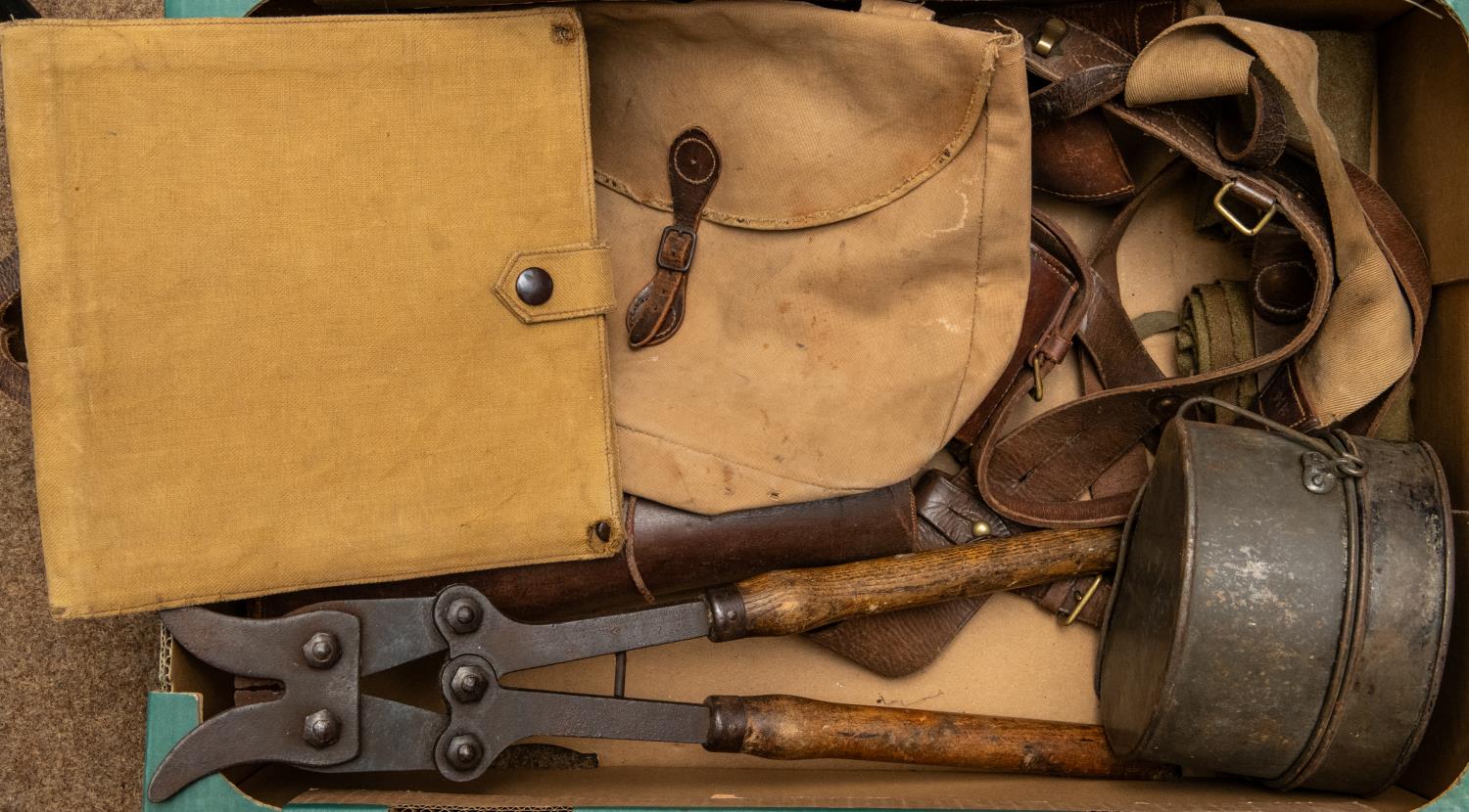A WWI double strap Sam Browne belt, a pair of leather gaiters; a pair ...
