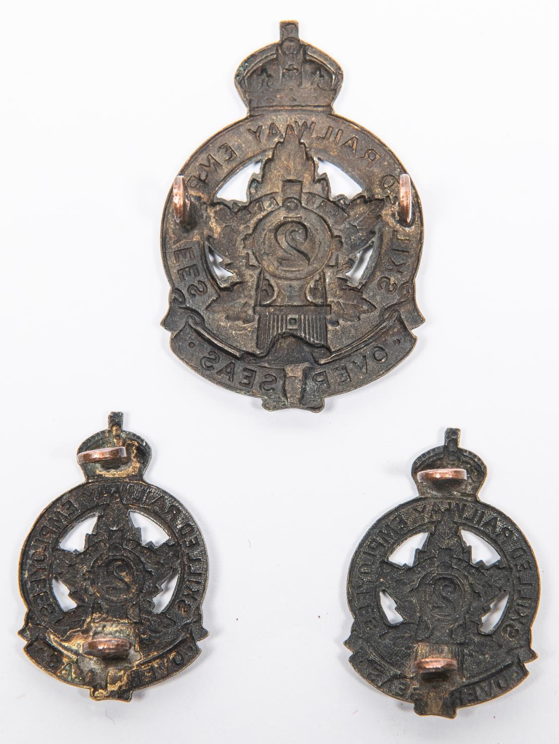 WWI CEF 2nd Overseas Skilled Railway Employees cap badge, and a pair of ...