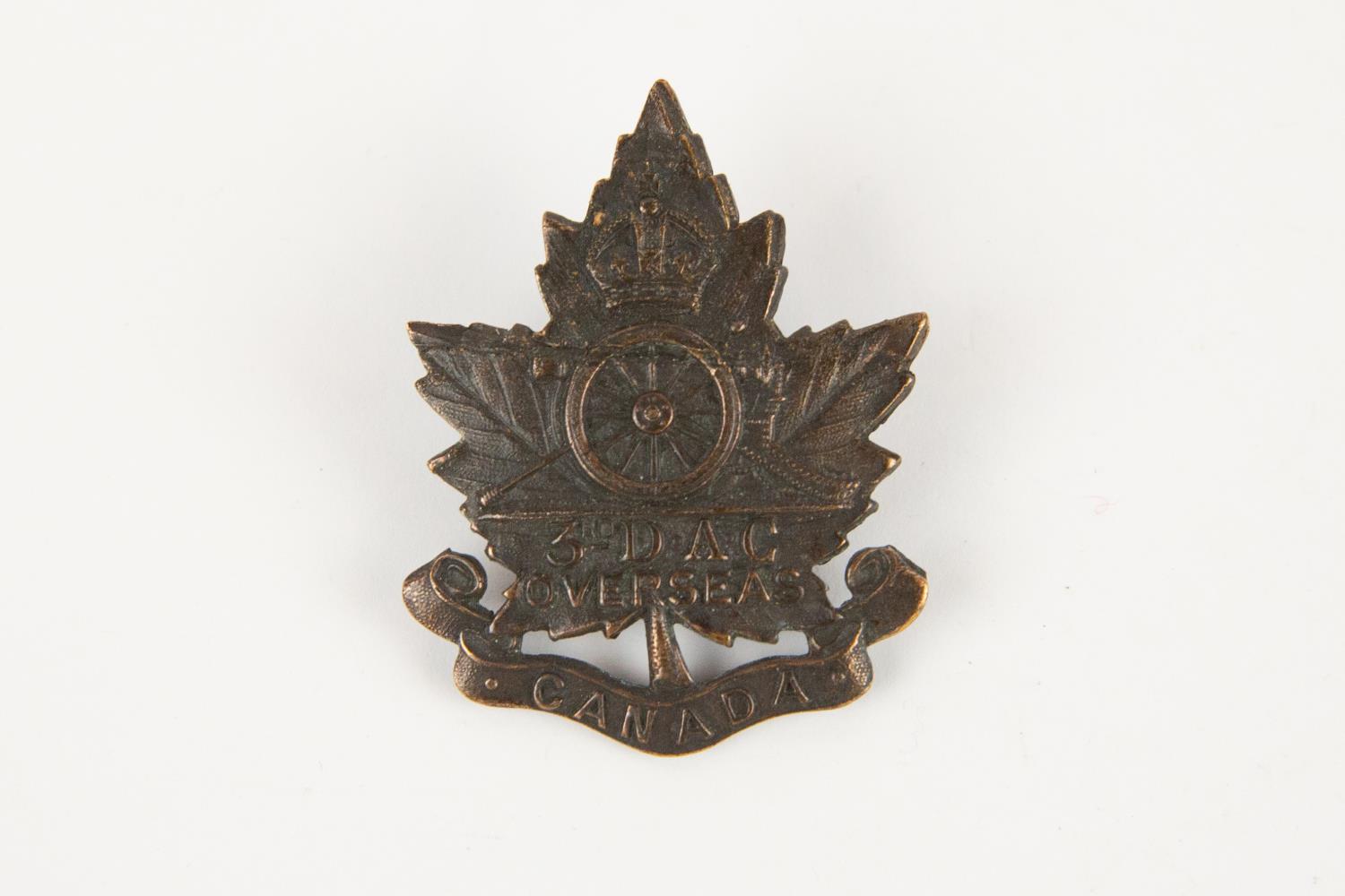 A WWI CEF cap badge of the 3rd Divisional Ammunition Column, by Birks ...