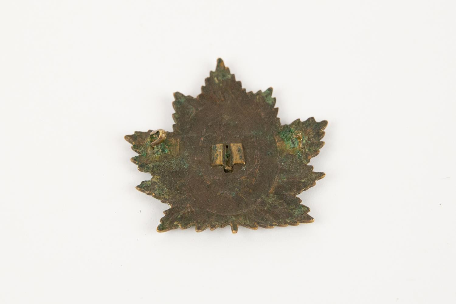 A scarce WWI CEF cap badge of the 46th (Queen's University) Overseas ...