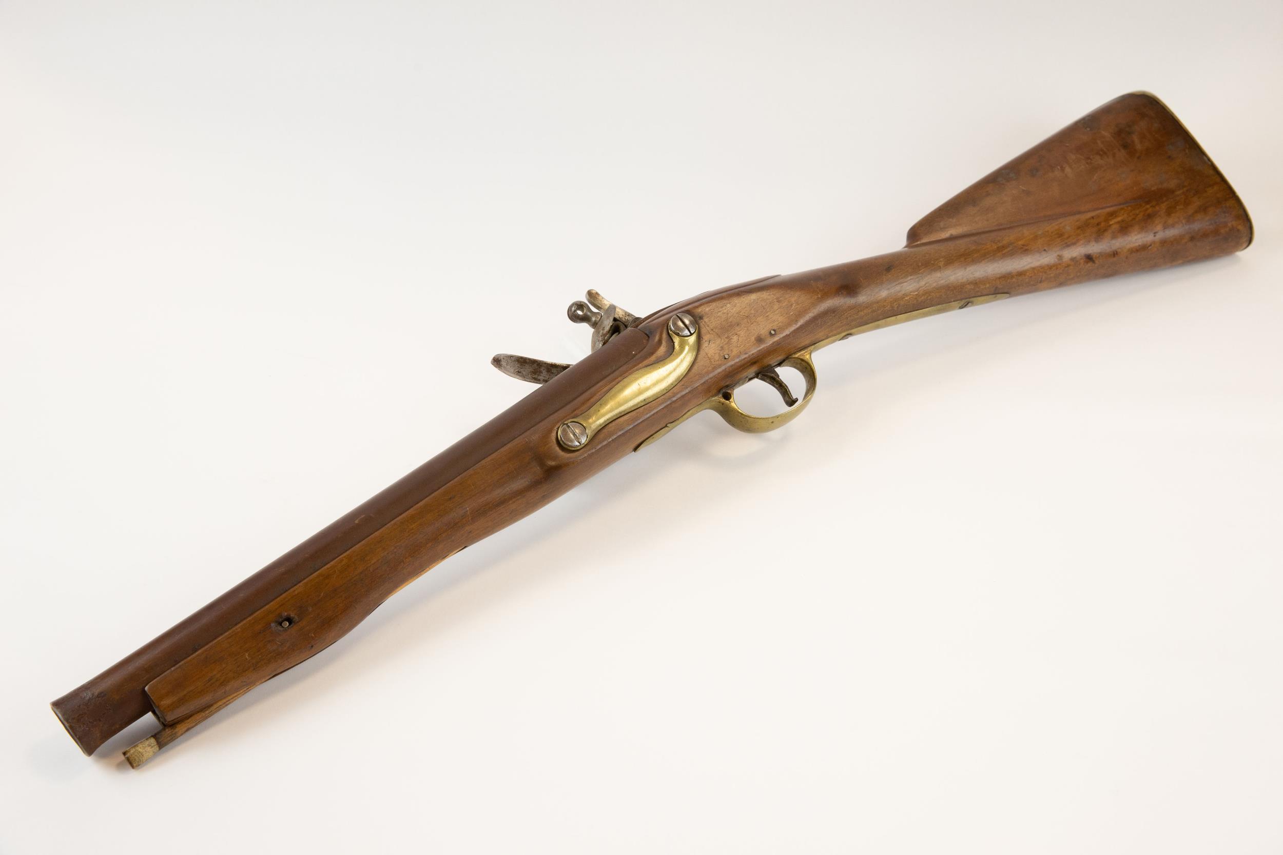 A flintlock musketoon, converted from a Brown Bess musket, 29½" overall ...