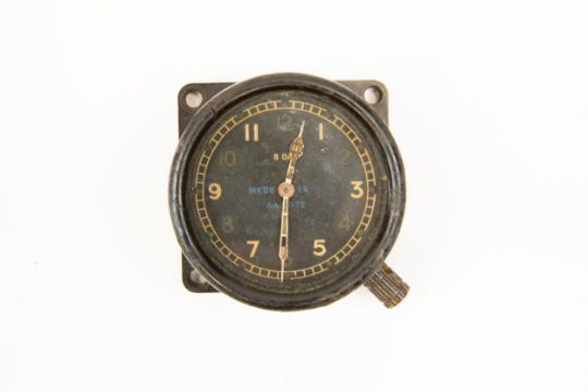 A WWII Air Ministry MkII 8 day aircraft clock, the face marked "4910/43 ...