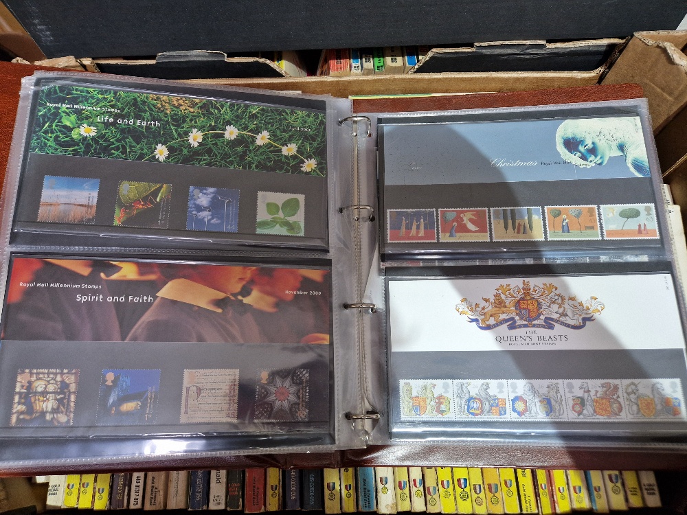 Three albums of Royal Mail Presentation Packs.