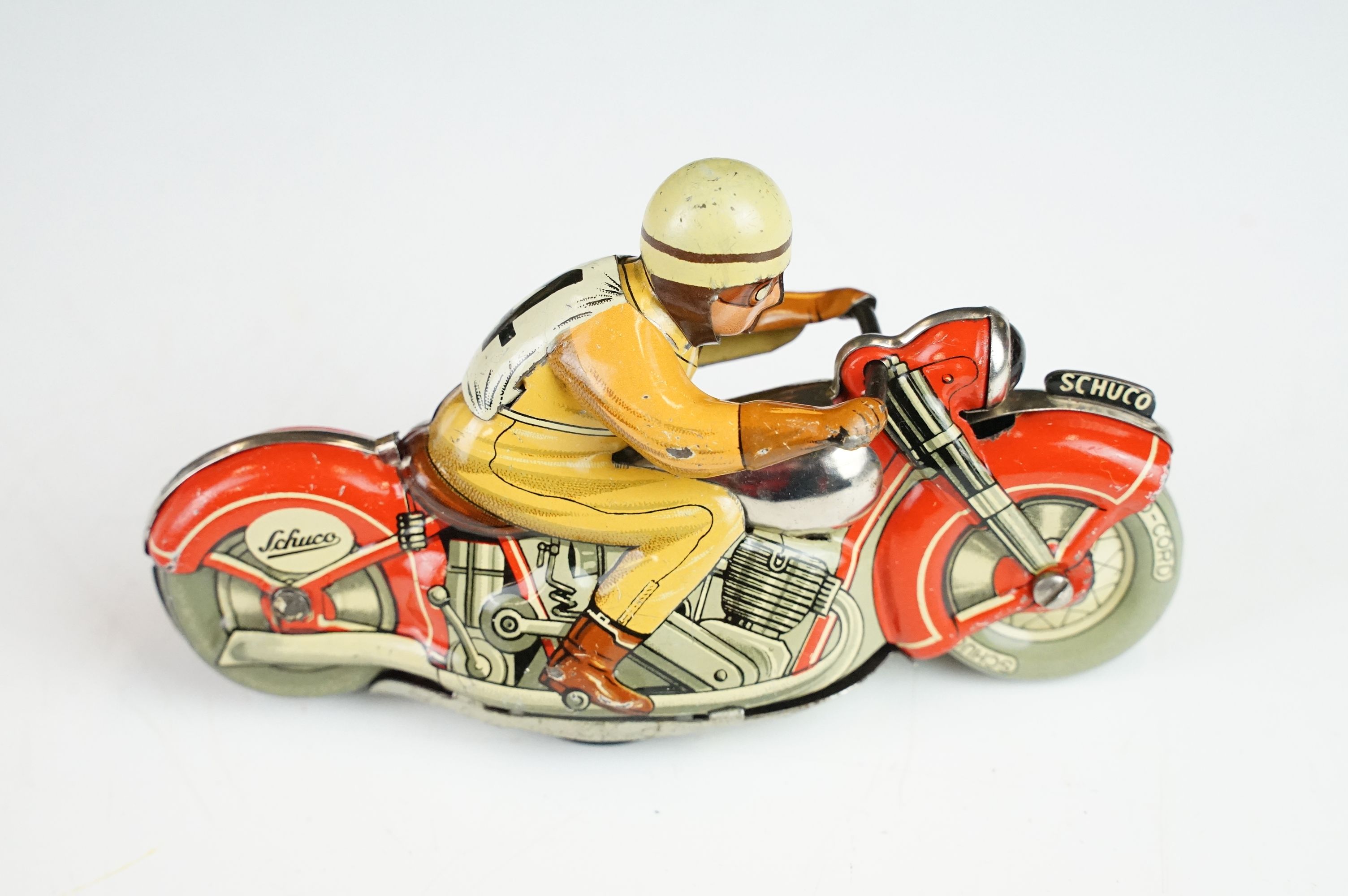 Schuco Moto-Dril 1006 tinplate clockwork model (no key) plus a boxed ...