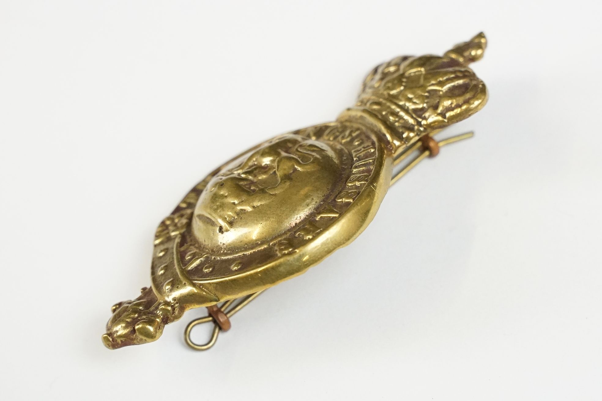 A Victorian military 'The Kings Hussars' horse brass badge with twin ...