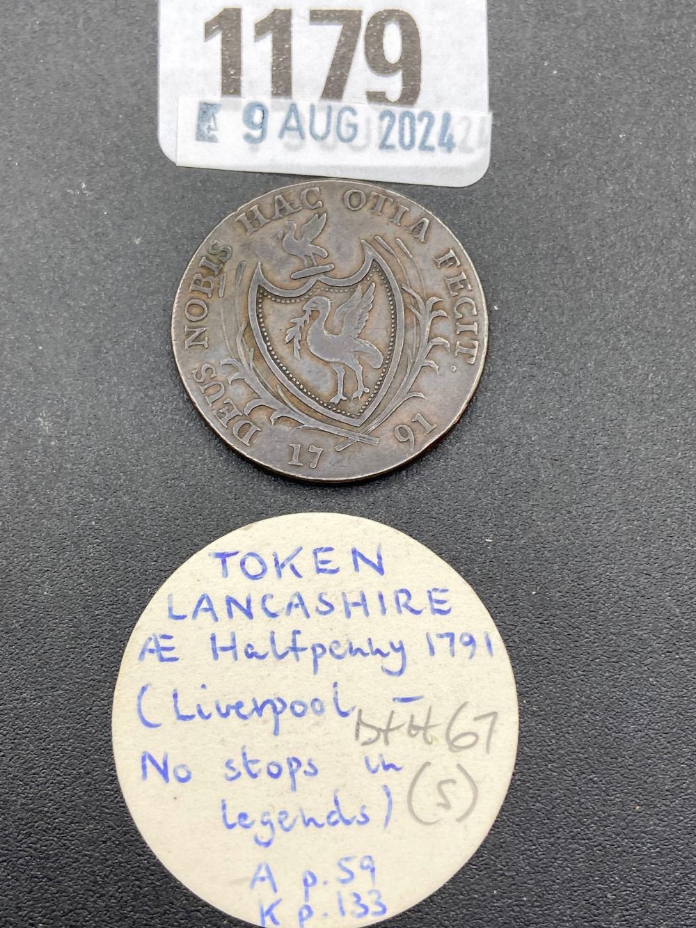 Liverpool half penny token with old label