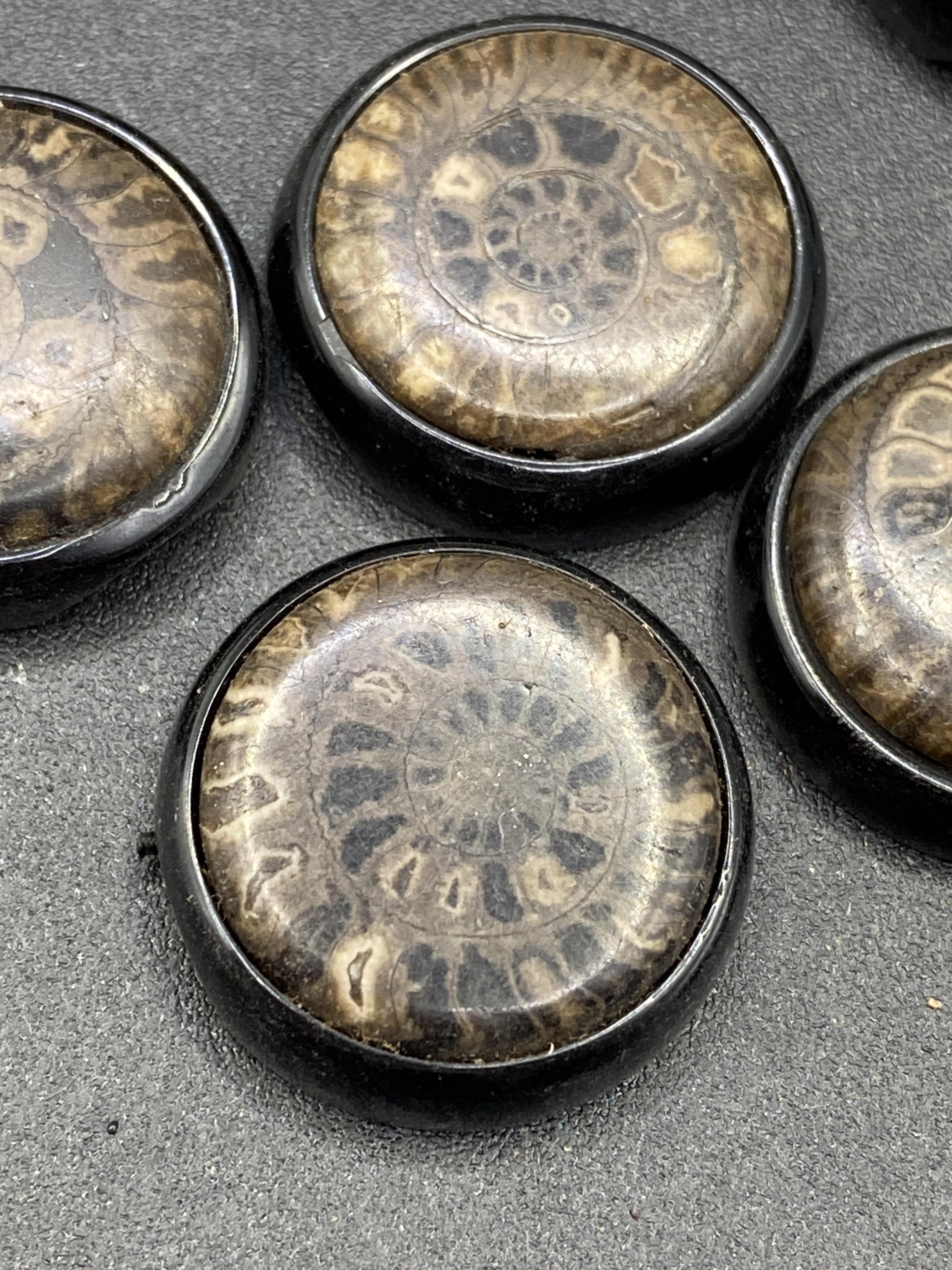 A pair of banded agate buttons etc.