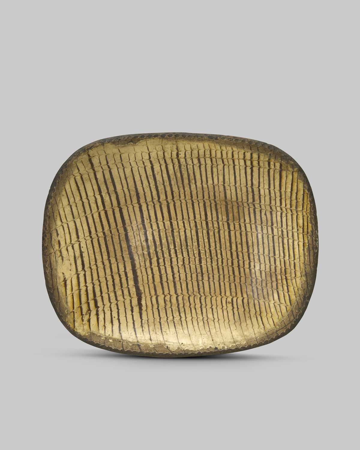 A large Isleworth combed slipware dish, 18th century, the shallow ...
